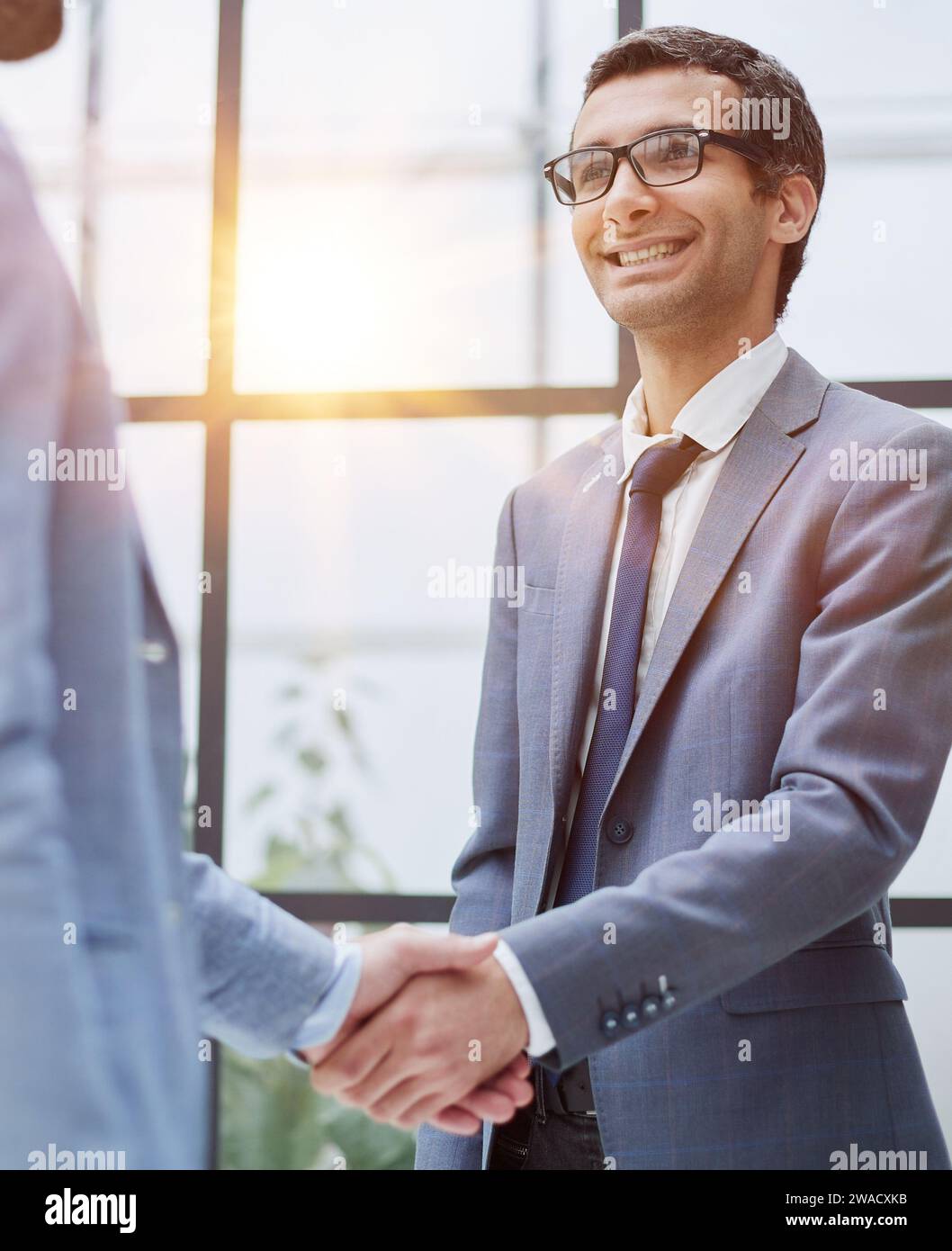 Two business men shaking hands together after successful meeting Stock ...