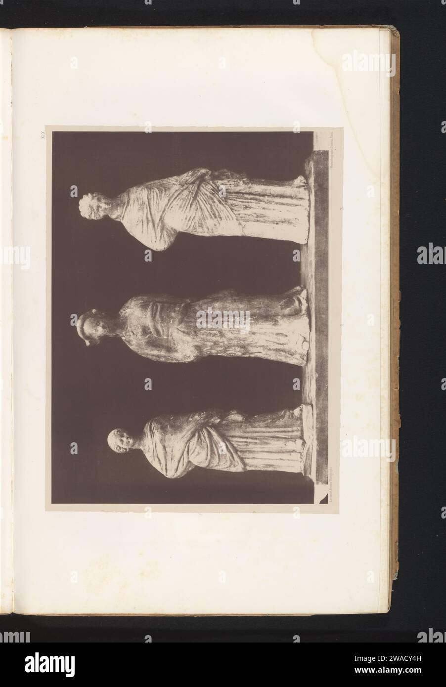 Three terracotta sculptures of a woman, a priestess of Bacchus and a ...