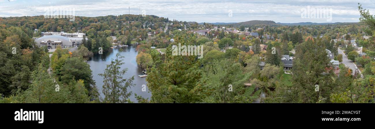 A panorama view from the Lions Lookout hill looking south over the muskoka river and Huntsville ...