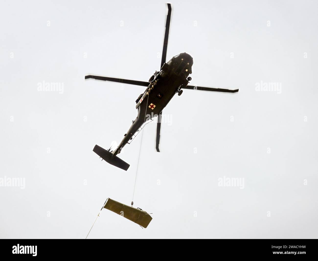 U.S. Army UH-60L Black Hawk helicopter crew chiefs with Charlie Company ...