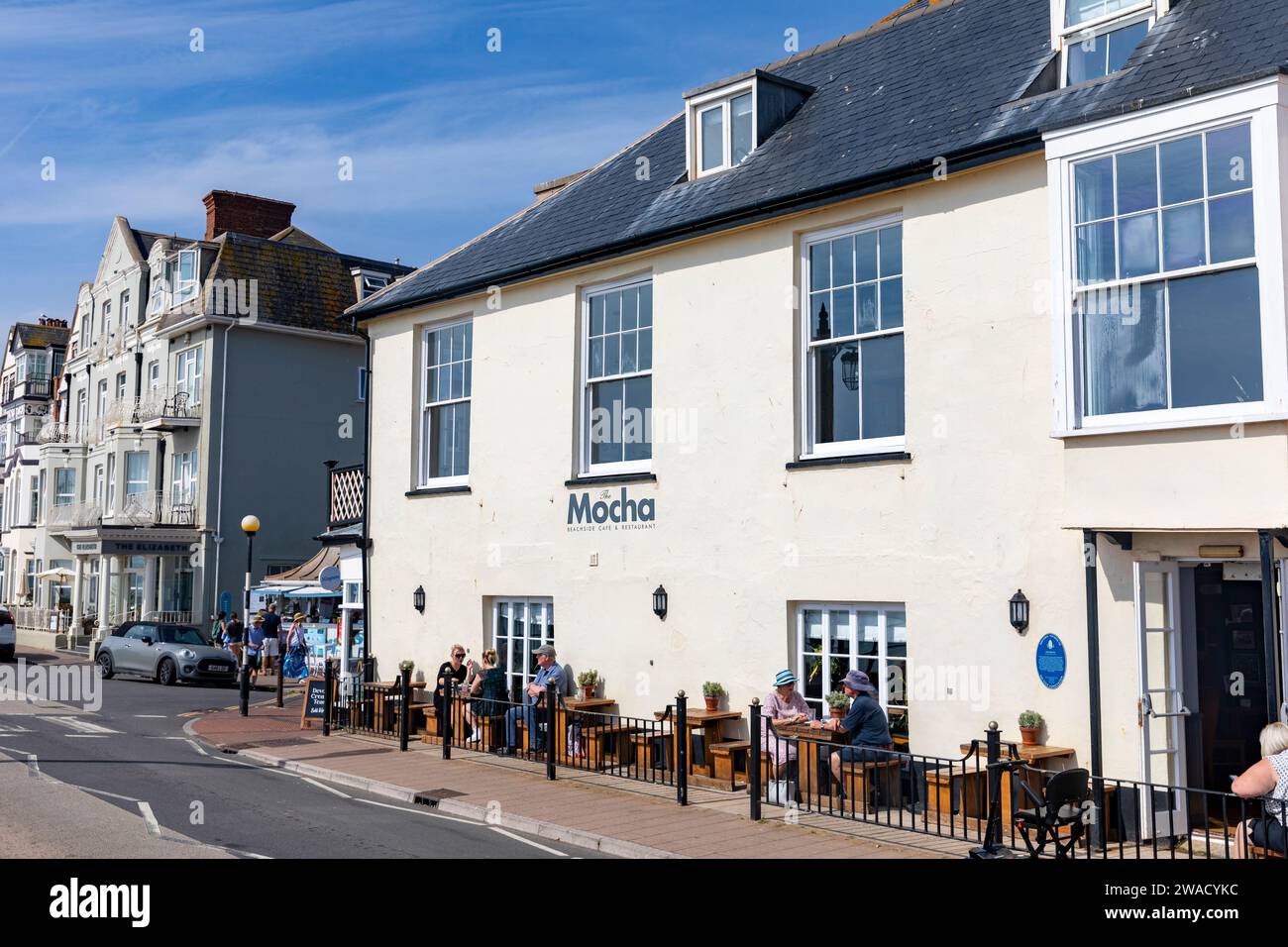 Sidmouth town centre Devon, Mocha cafe and restaurant with people ...