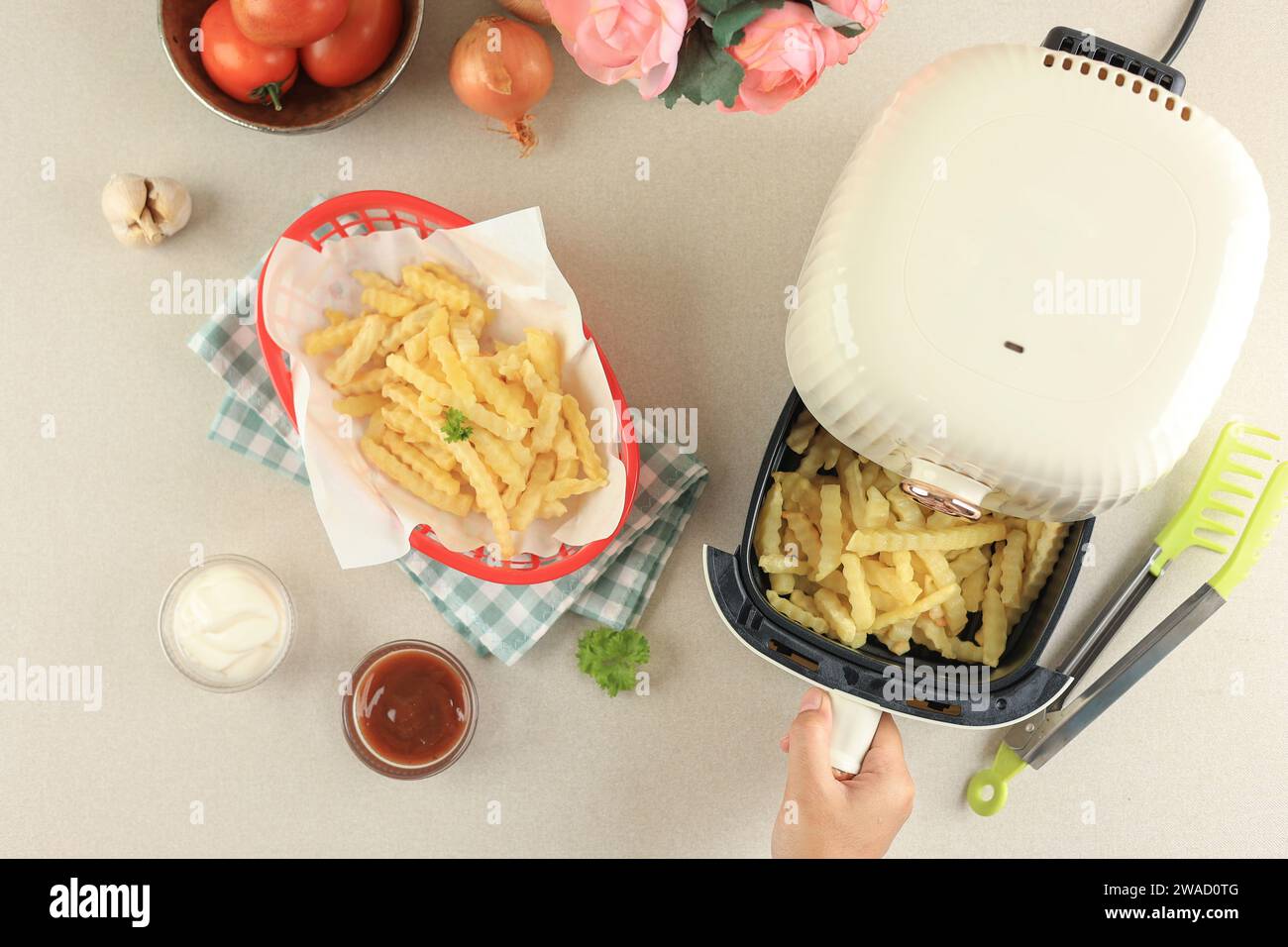 French fries hand food female hi-res stock photography and images - Alamy