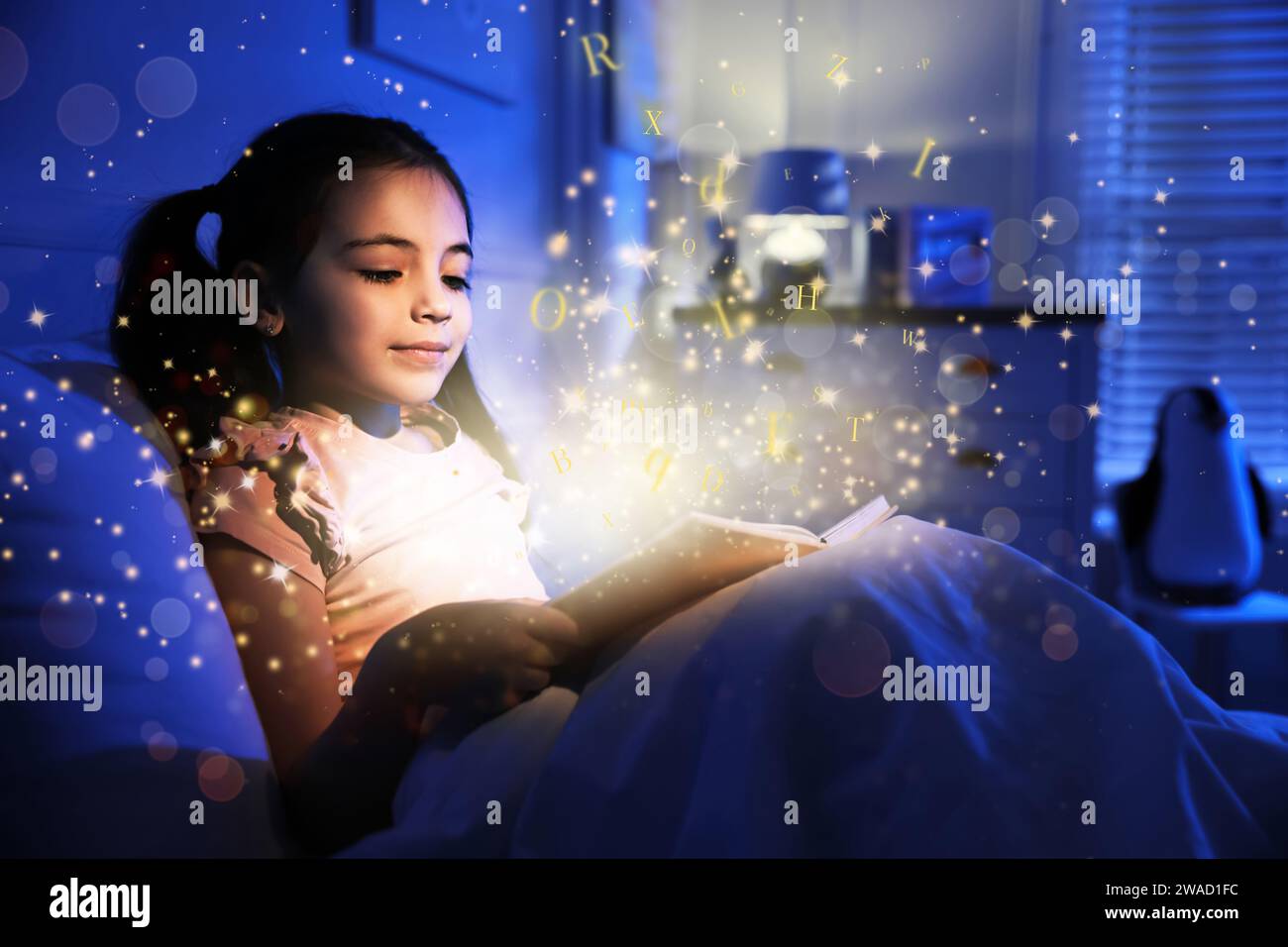 Girl reading shiny magic book with letters flying over it in dark ...