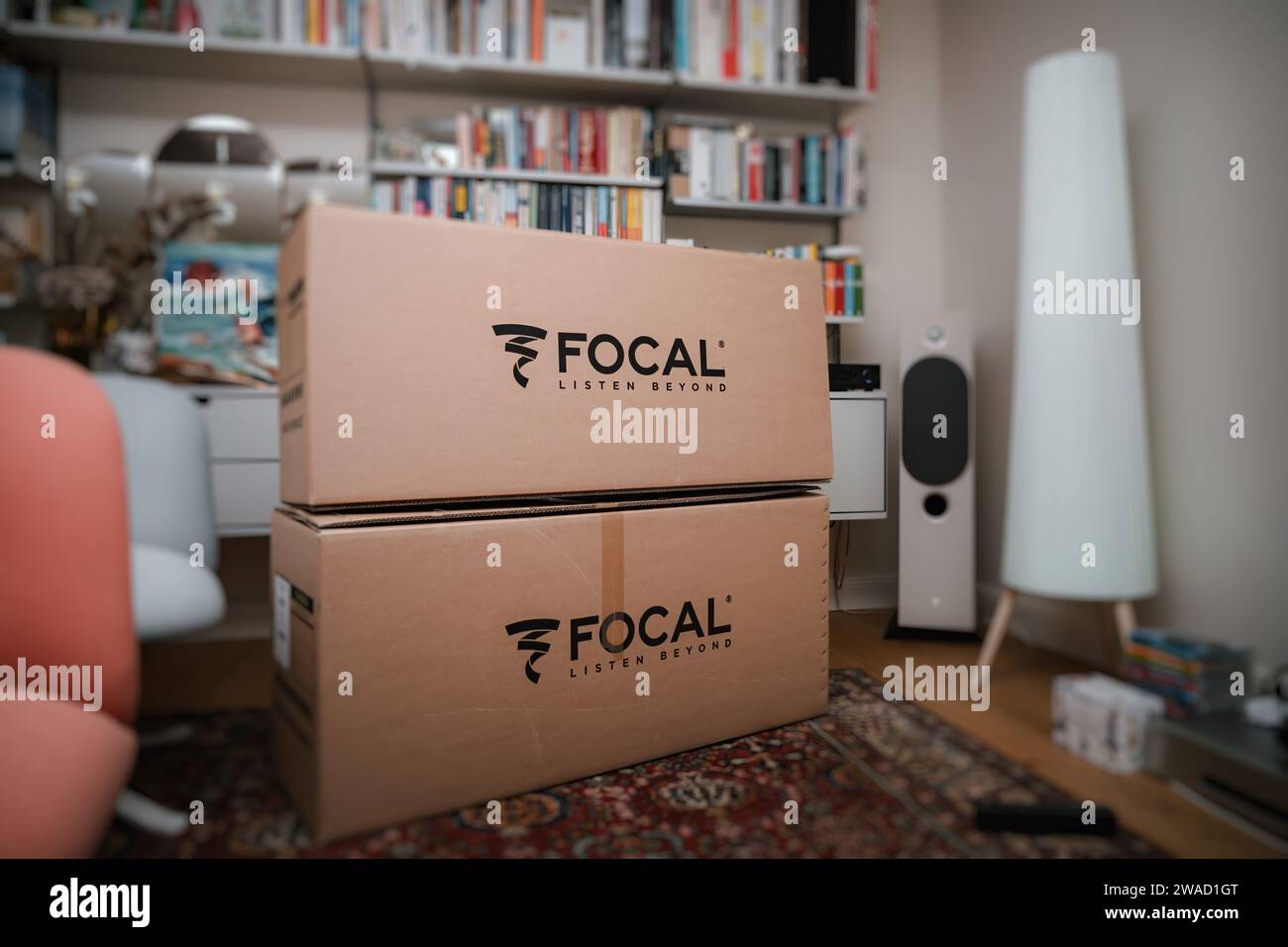 Paris, France - Nov 15, 2023: An overhead view of hands unboxing Focal ...