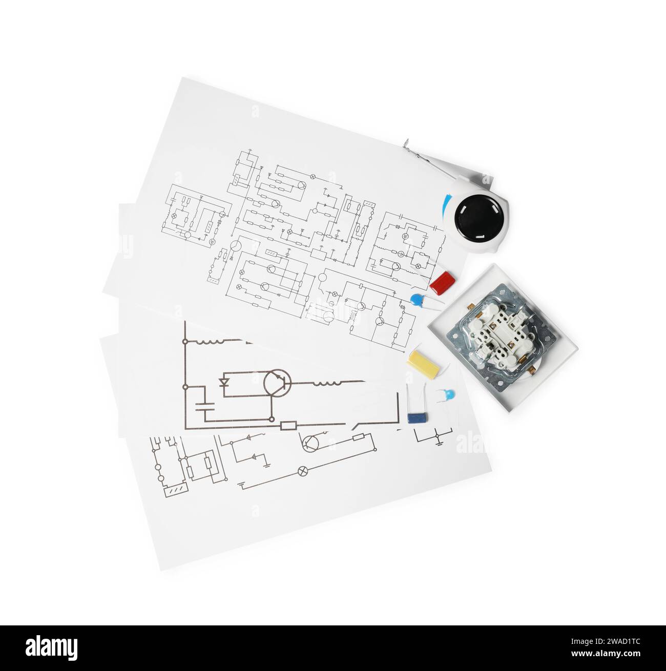Wiring diagrams, tape measure and disassembled light switch isolated on ...