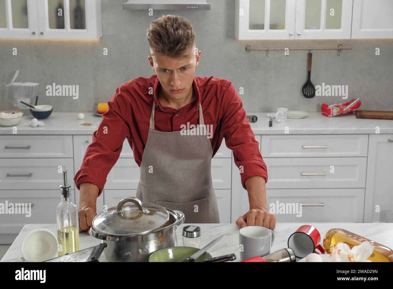 Messy pile of cooking utensils hi-res stock photography and images - Alamy