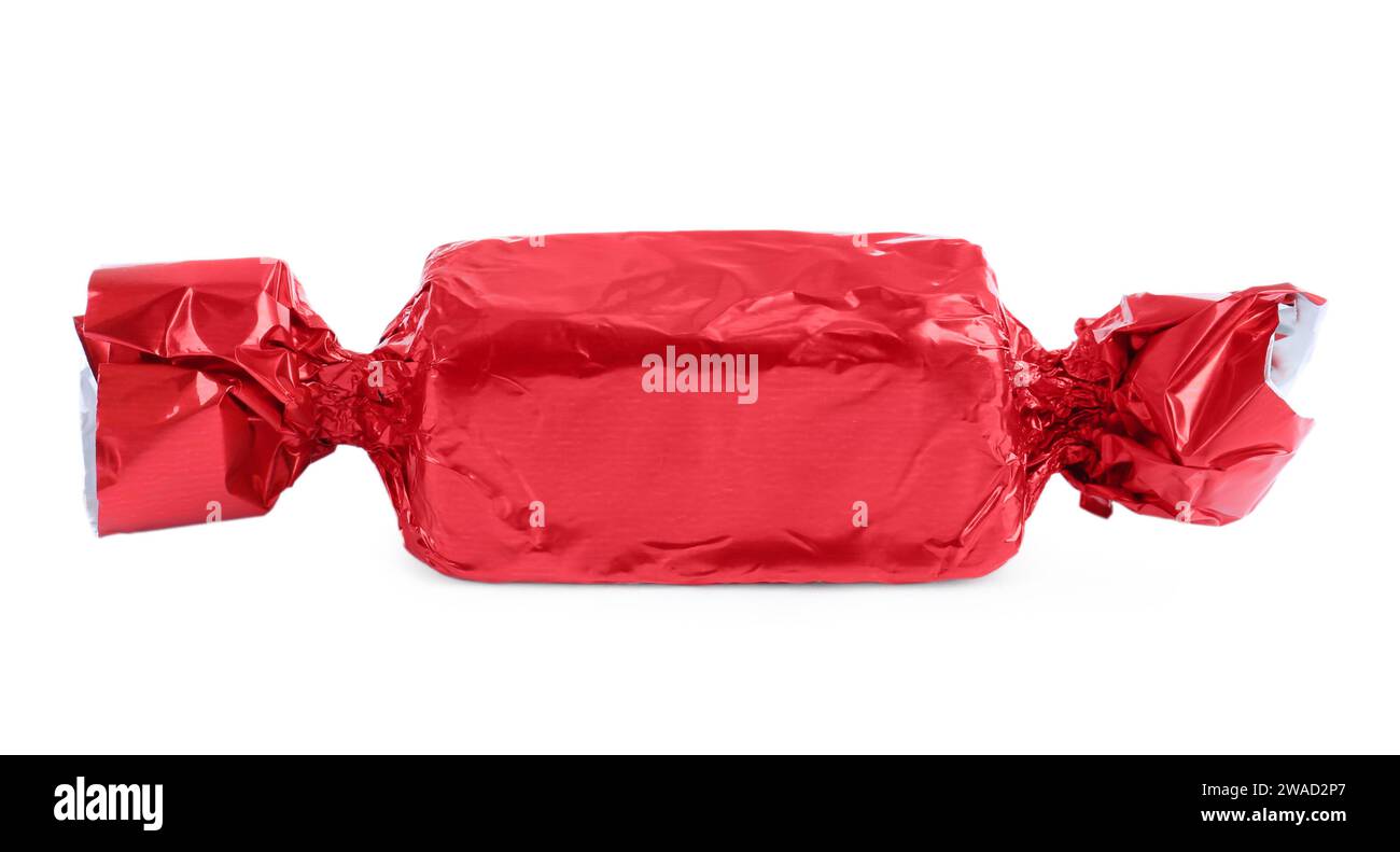 Tasty candy in red wrapper isolated on white Stock Photo - Alamy