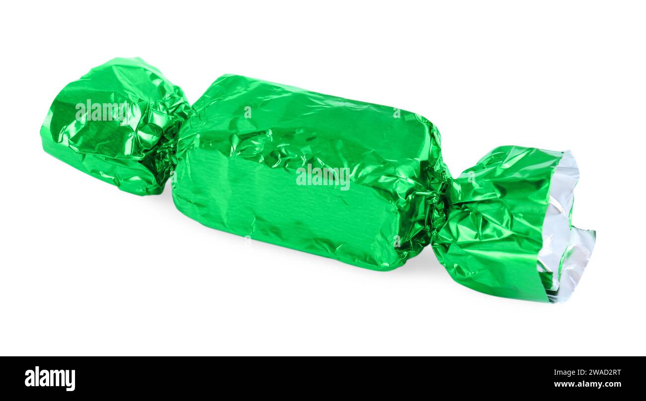 Tasty candy in green wrapper isolated on white Stock Photo - Alamy