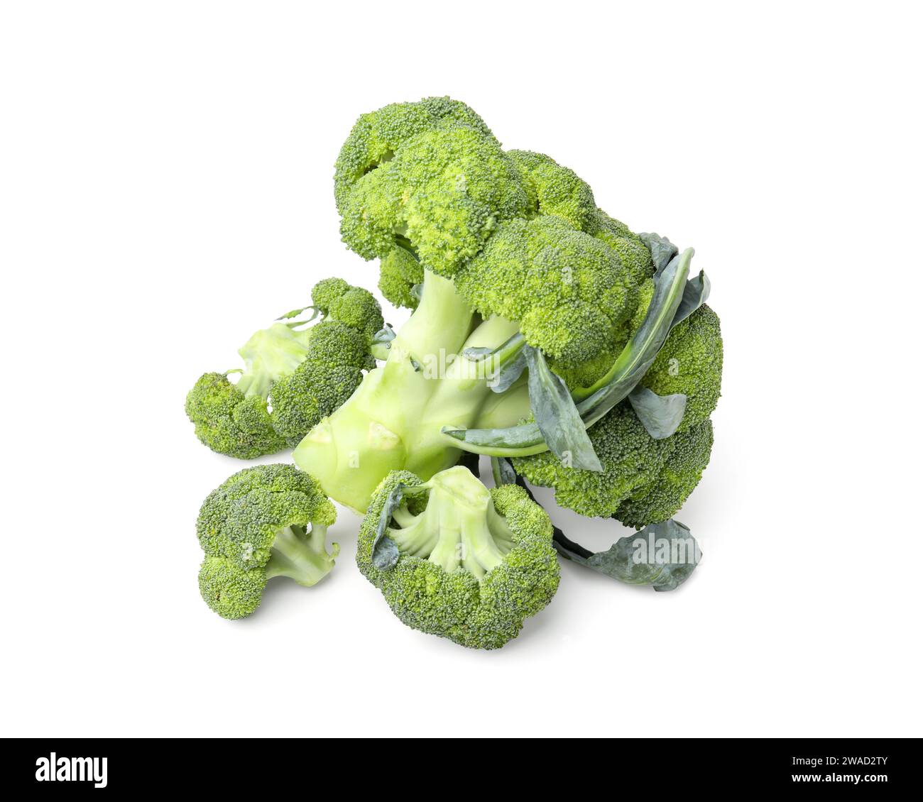 Pile of fresh raw green broccoli isolated on white Stock Photo - Alamy
