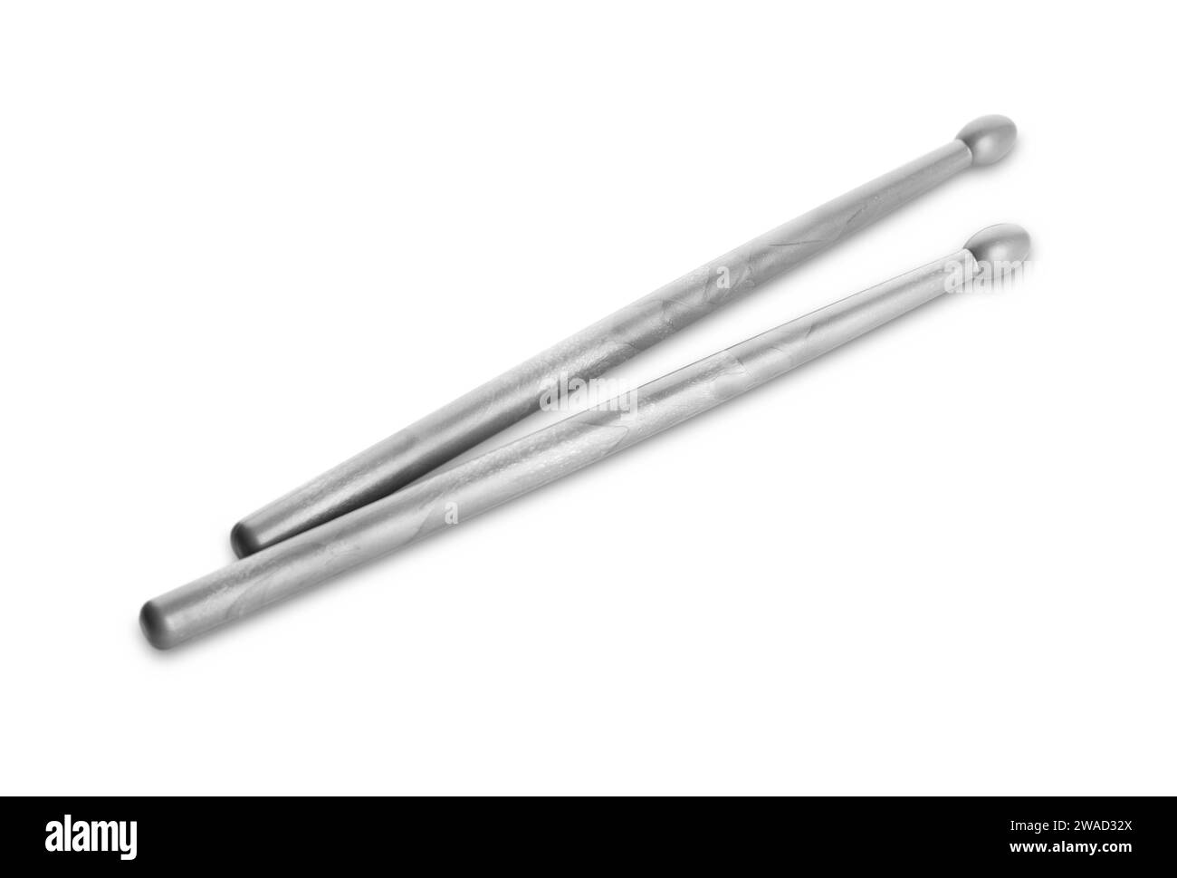Two grey drum sticks isolated on white Stock Photo - Alamy