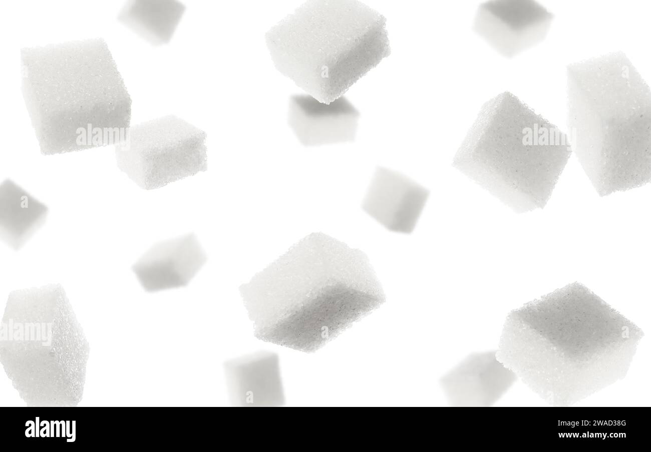Cubes of sugar falling on white background Stock Photo - Alamy