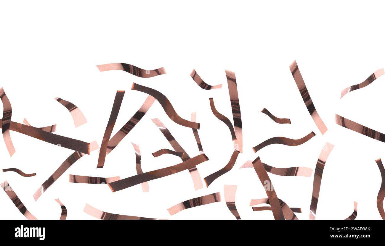 Shiny bronze confetti falling on white background Stock Photo - Alamy