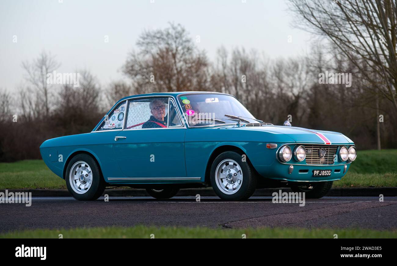 Stony Stratford,UK Jan 1st 2024. 1969 blue LANCIA FULVIA car arriving ...