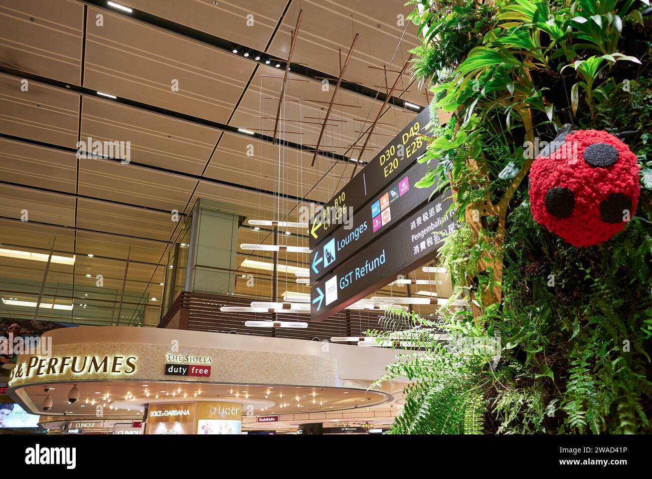SINGAPORE - NOVEMBER 07, 2023: decorations, direction signs and ...