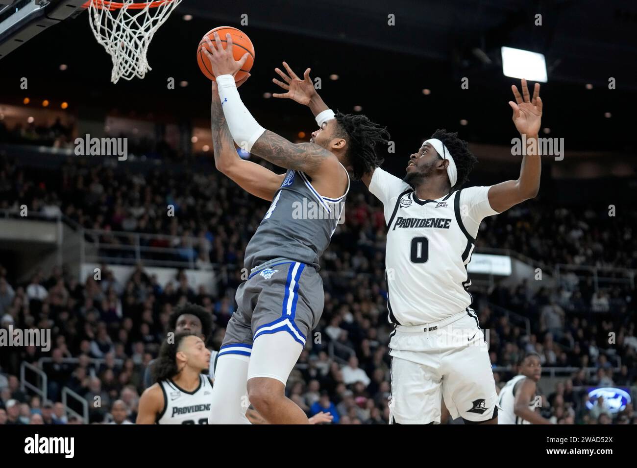 Seton Hall guard Dre Davis (14) shoots as Providence guard Ticket ...