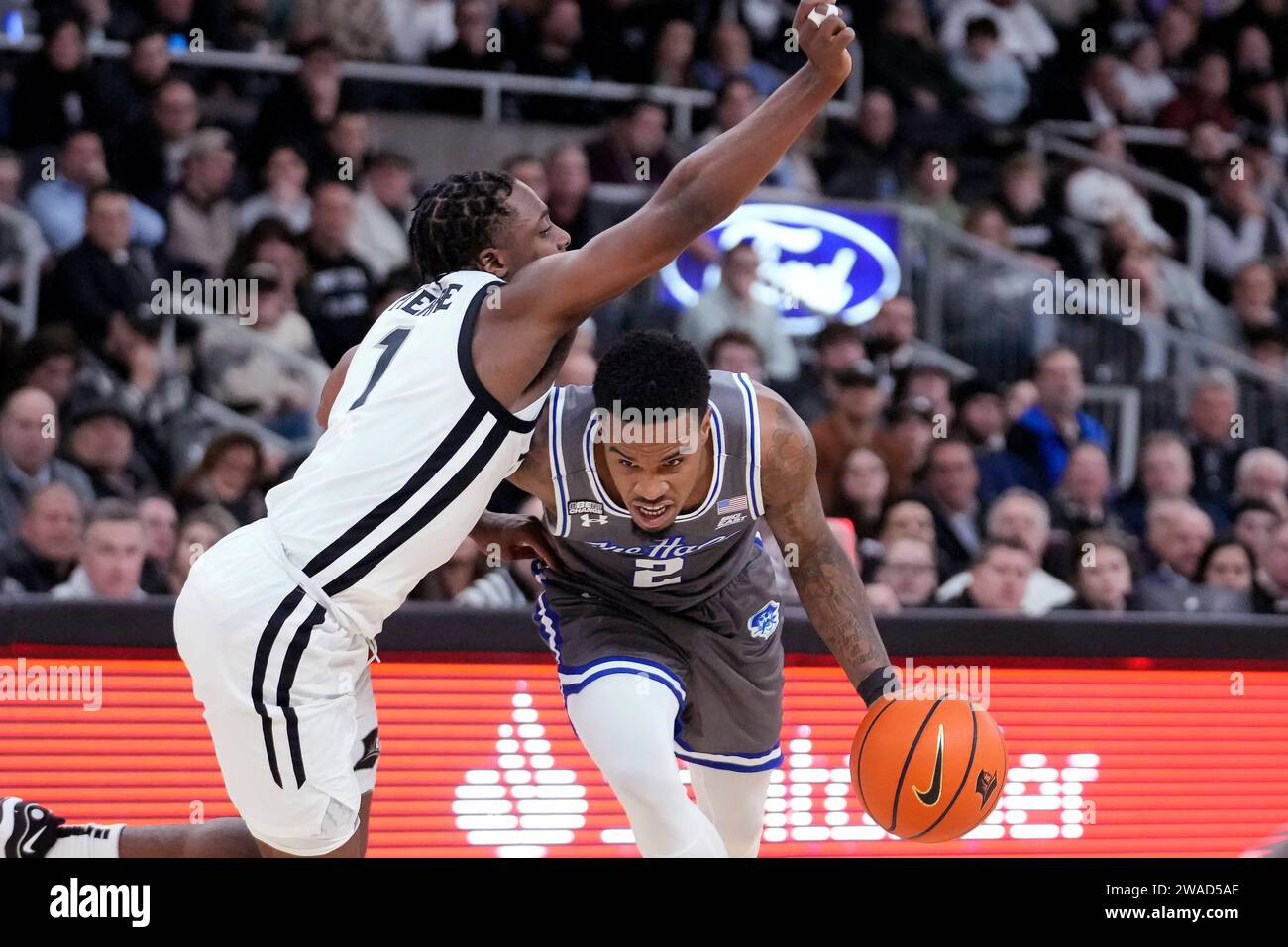 Seton Hall guard Al-Amir Dawes (2) drives past Providence guard Jayden ...