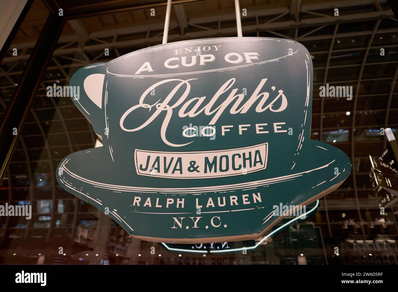 SINGAPORE - NOVEMBER 05, 2023: close up shot of Ralph’s Coffee sign as ...