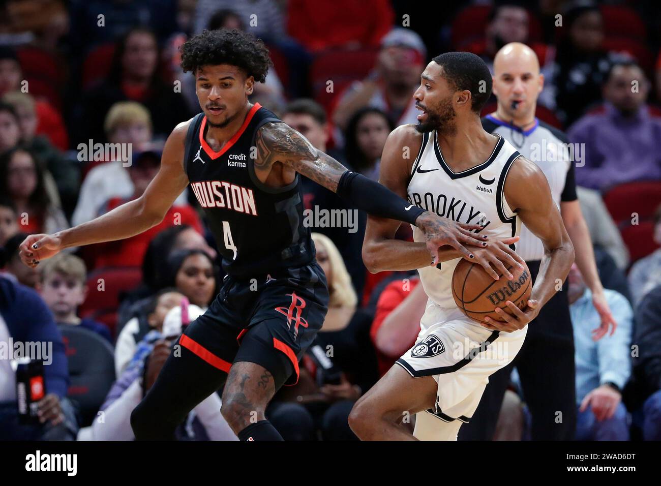 Brooklyn Nets forward Mikal Bridges, right, protects the ball as ...