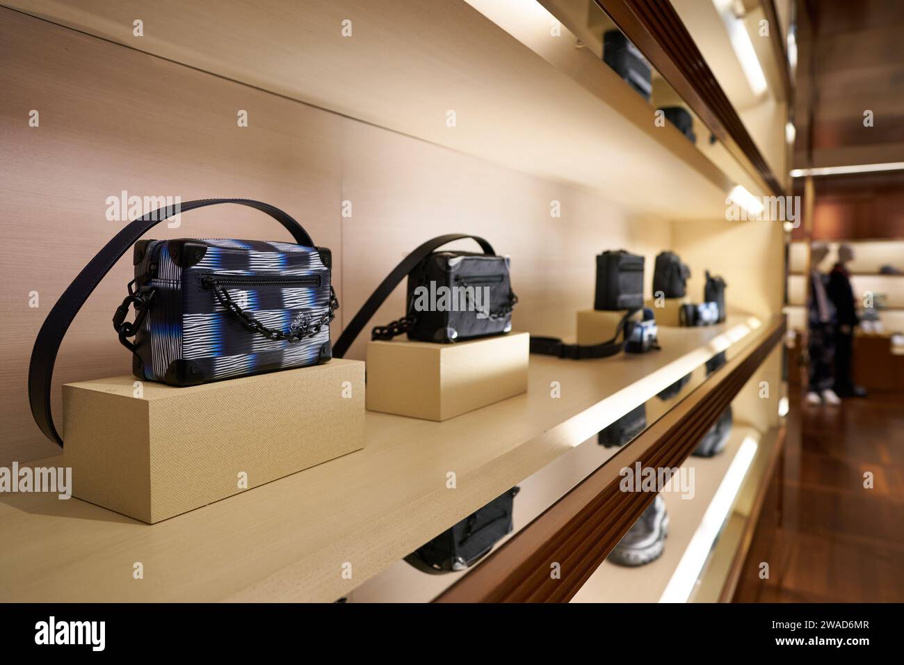 SINGAPORE - NOVEMBER 05, 2023: goods on display inside Louis Vuitton's ...