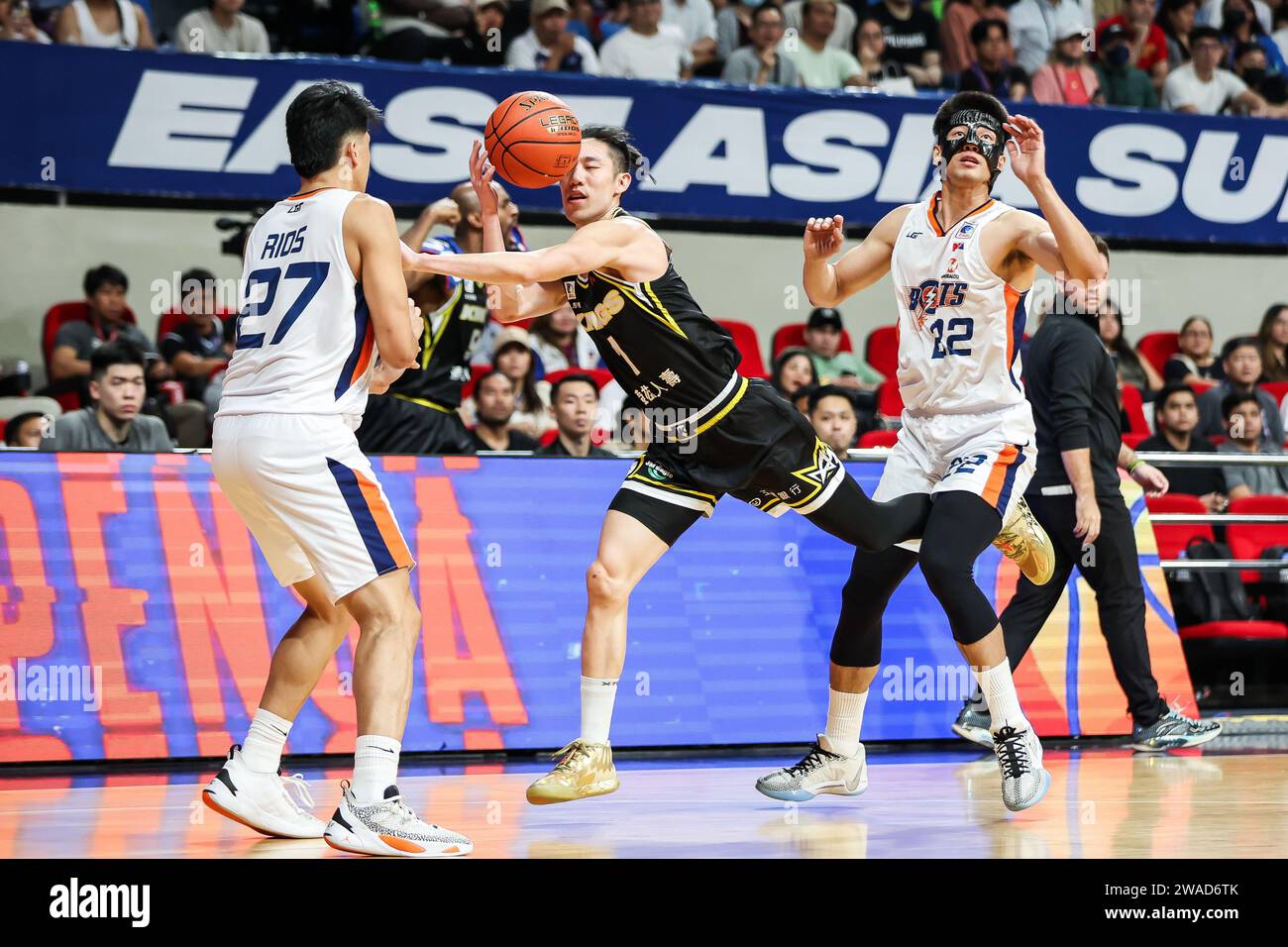 Pasig City, Philippines. 3rd Jan, 2024. Joseph Lin (C) of New Taipei ...