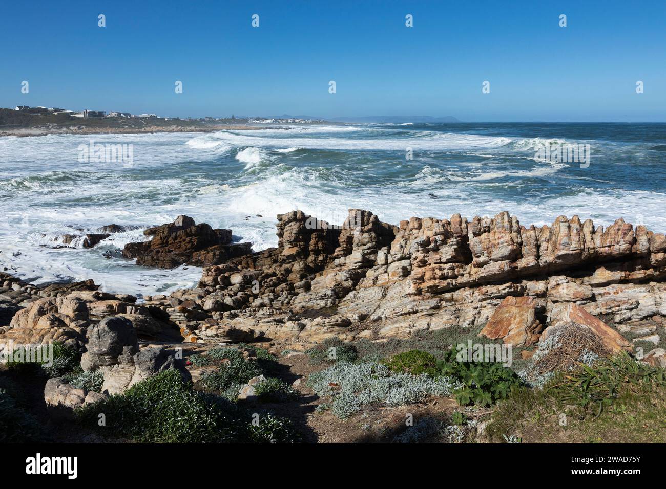 South Africa, Hermanus, Rocky coastline and sea at Onrus Beach Stock ...