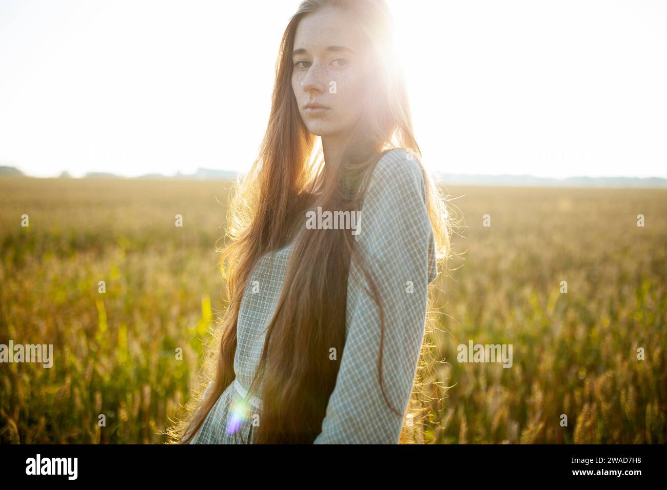 Beautiful woman posing in rural area Stock Photo - Alamy