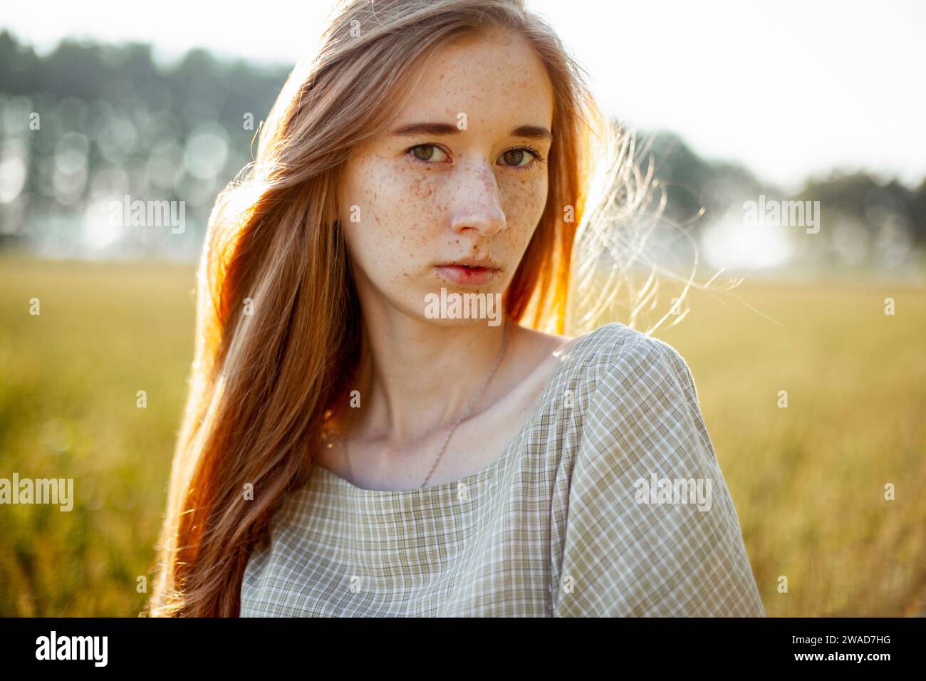 Beautiful woman posing in rural area Stock Photo - Alamy