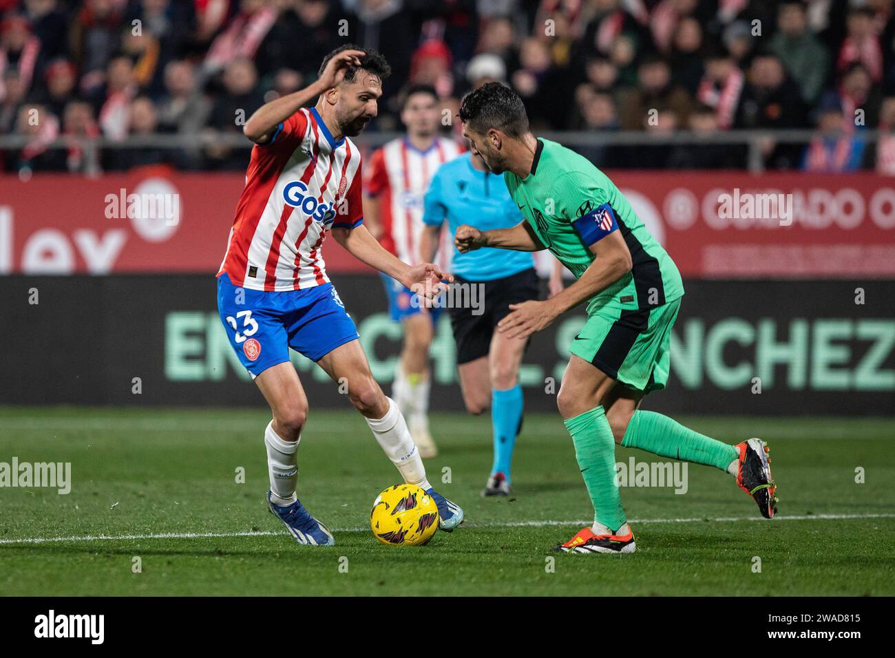 Girona, Spain. 03rd Jan, 2024. Iván Martín (L) of Girona F.C and Jorge Resurrección Merodio (R ...
