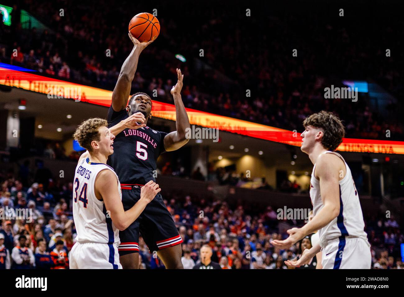 Charlottesville, VA, USA. 3rd Jan, 2024. Louisville Cardinals forward ...