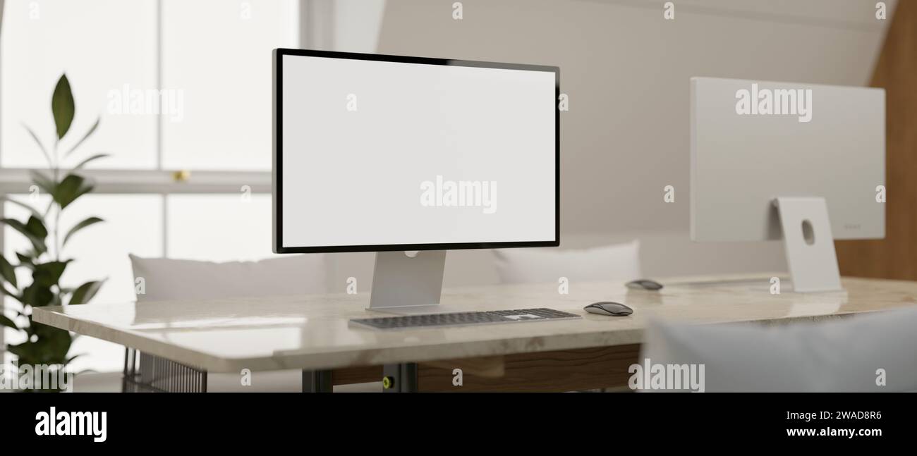 A modern white office with computers on a table. a white-screen computer mockup. 3d render, 3d ...