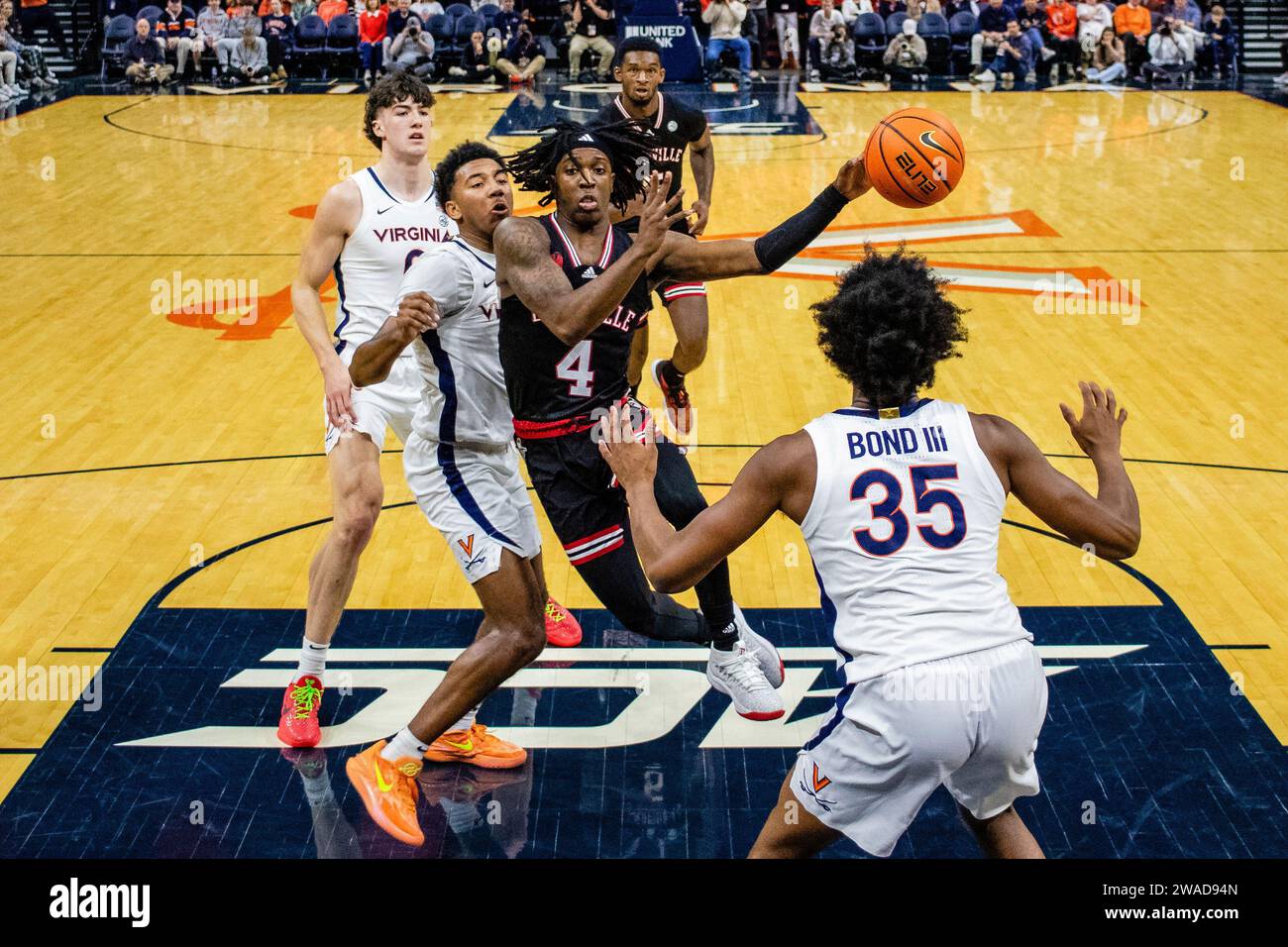 January 3, 2024: Louisville Cardinals guard Ty-Laur Johnson (4) passes ...