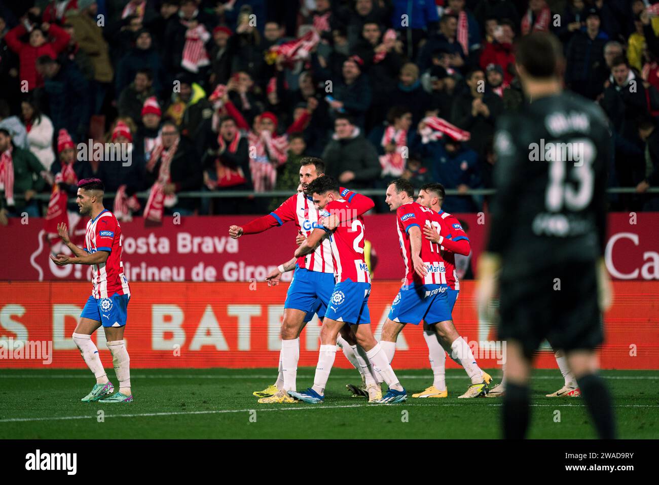 Girona, Spain. 3rd Jan, 2024. Players of Girona FC celebrate a goal during the La Liga football ...