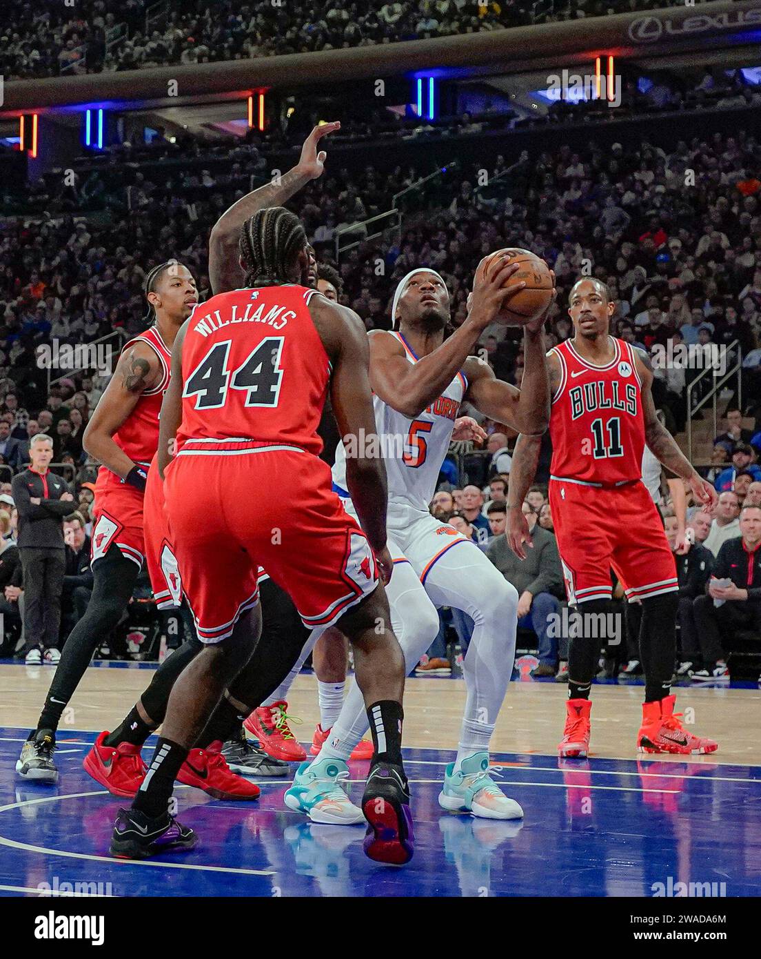 New York Knicks forward Precious Achiuwa (5) looks to shoot against ...