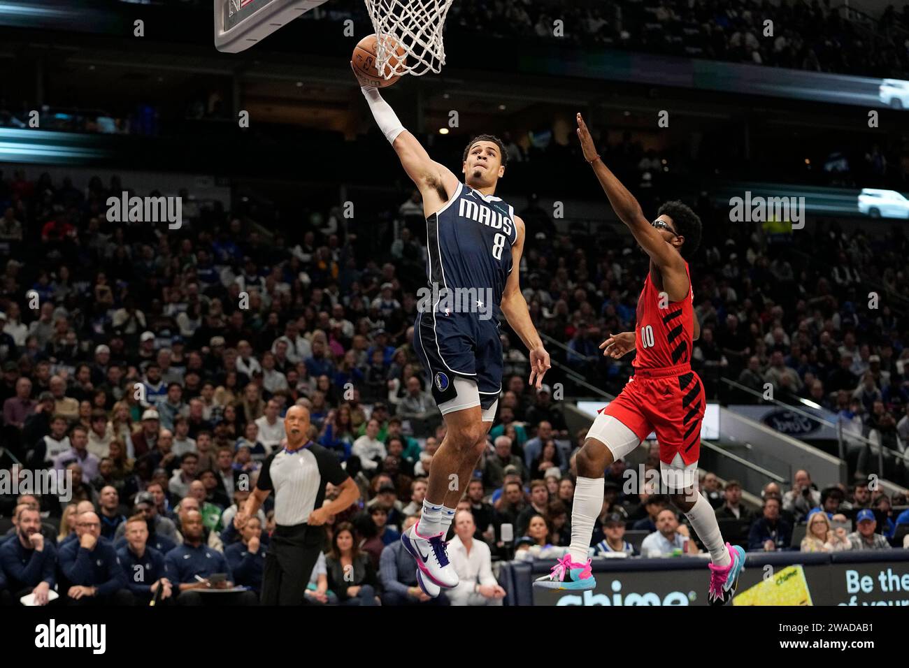 Dallas Mavericks guard Josh Green (8) scores against Portland Trail ...