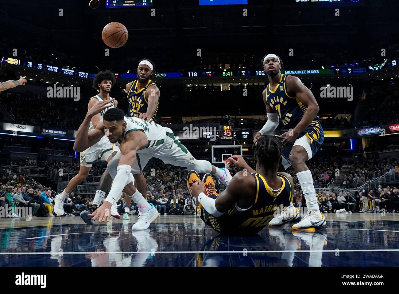 Indiana Pacers' Bennedict Mathurin (00) is called for a blocking foul ...
