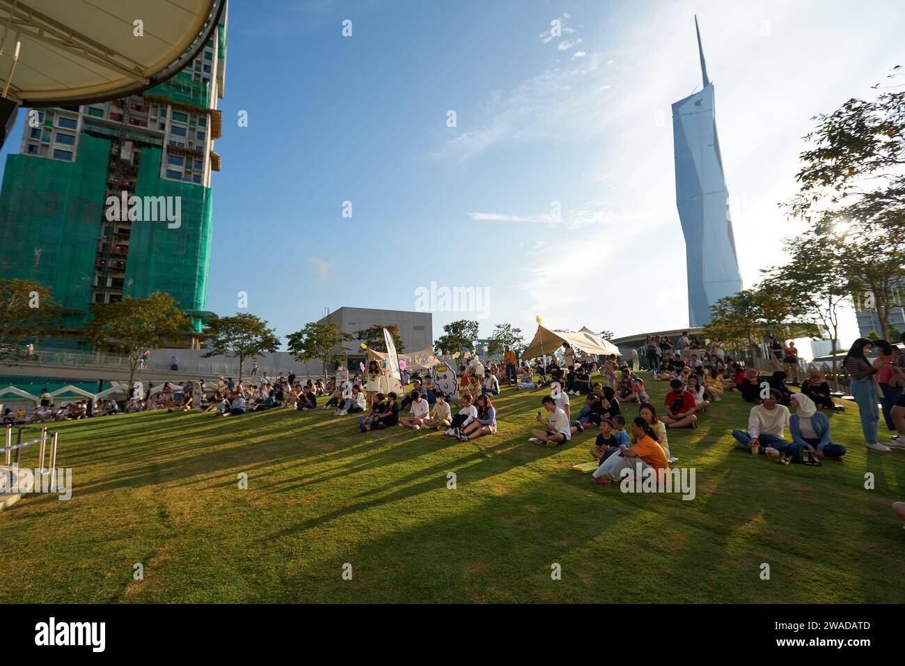 KUALA LUMPUR, MALAYSIA - CIRCA MAY, 2023: people sit in the Central ...