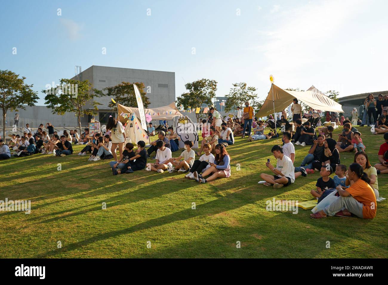 KUALA LUMPUR, MALAYSIA - CIRCA MAY, 2023: people sit in the Central ...