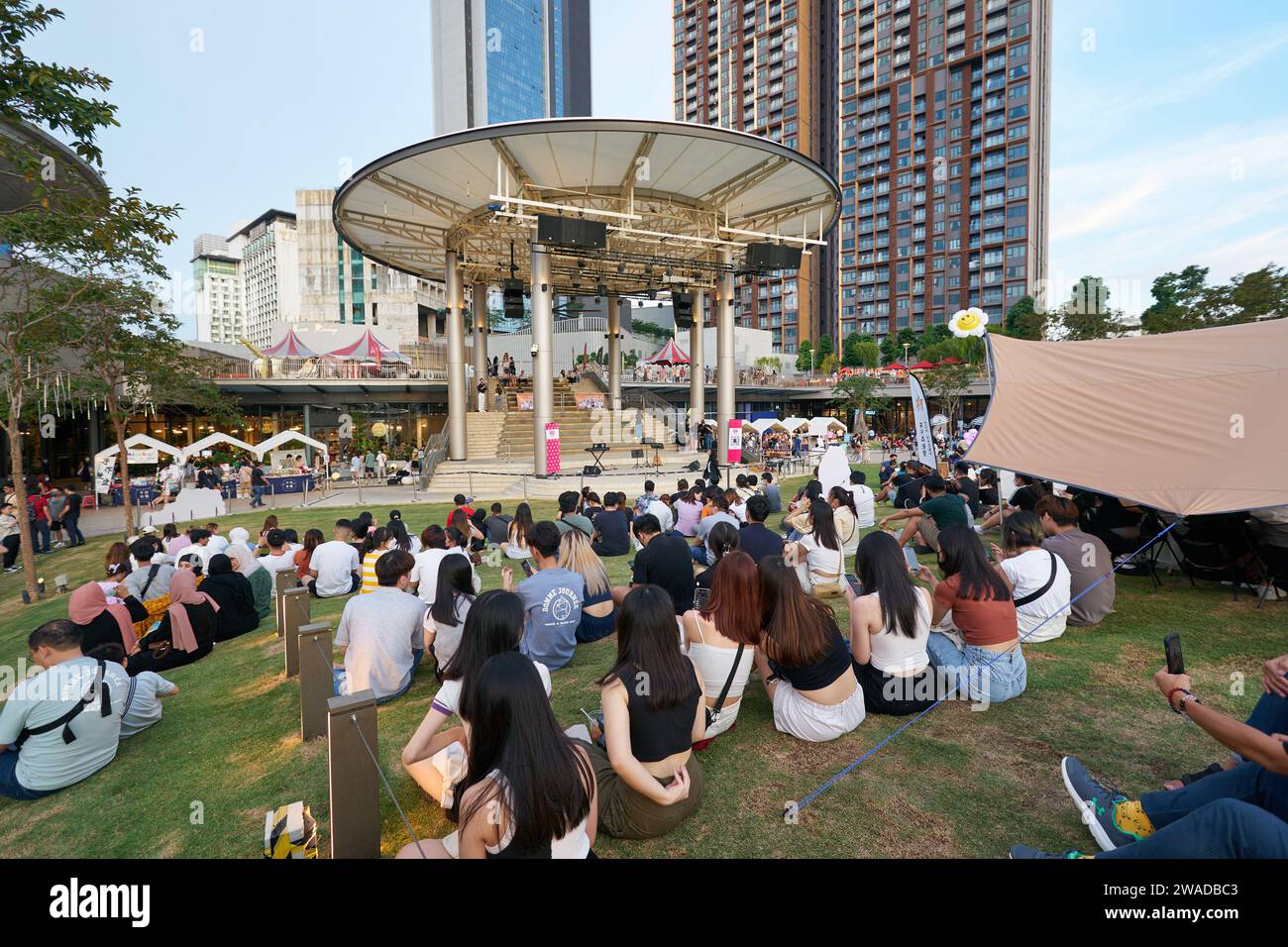 KUALA LUMPUR, MALAYSIA - CIRCA MAY, 2023: people sit in the Central ...