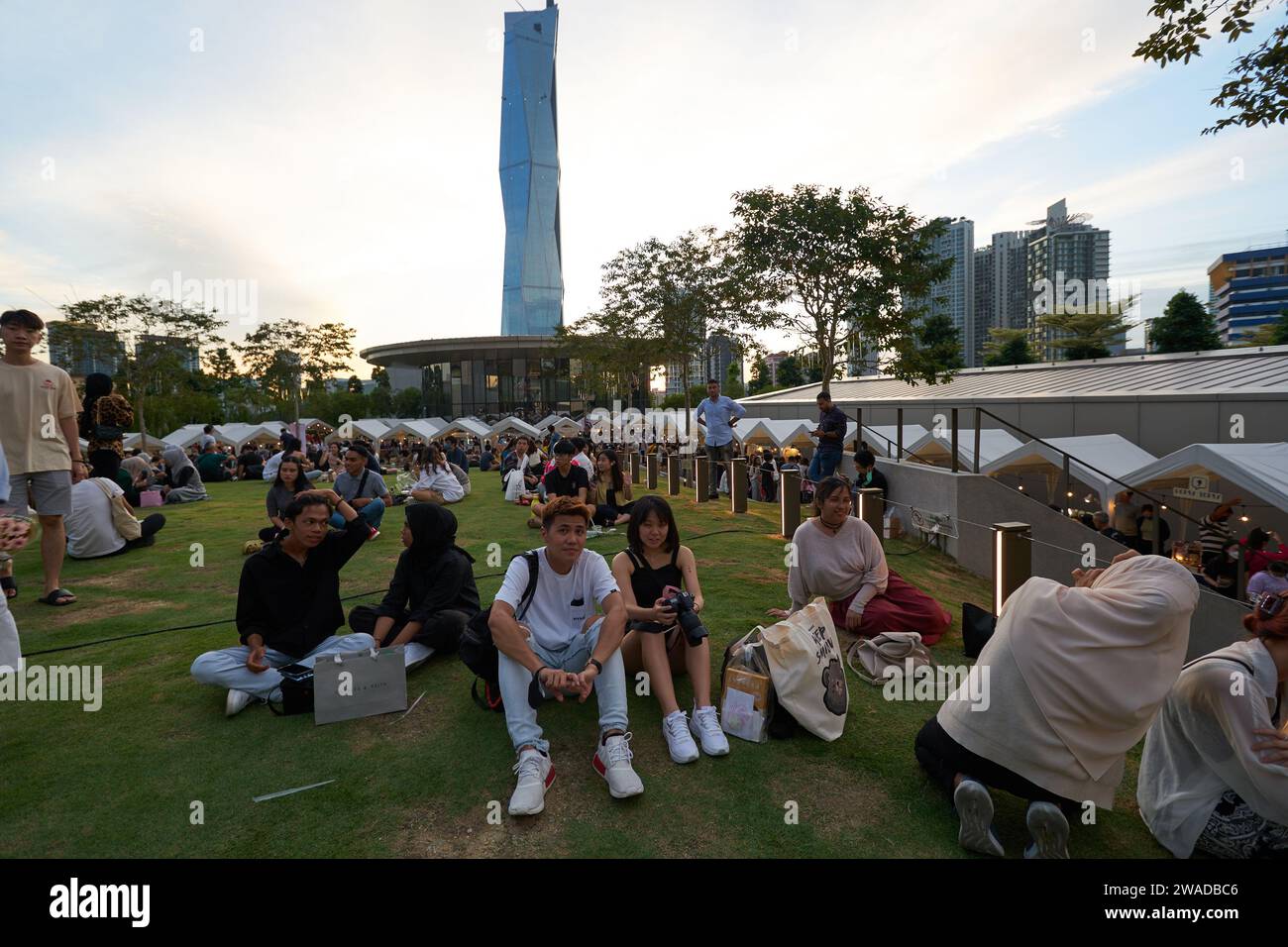KUALA LUMPUR, MALAYSIA - CIRCA MAY, 2023: people sit in the Central ...