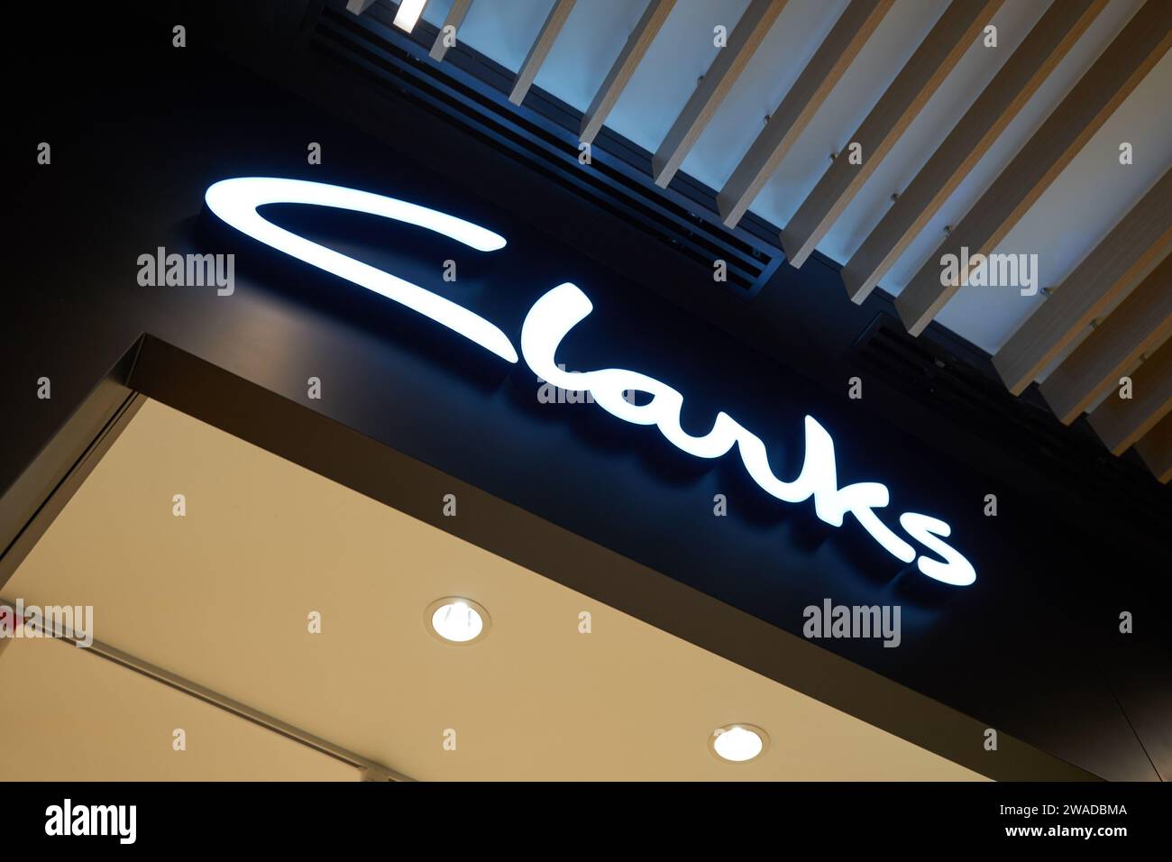 KUALA LUMPUR, MALAYSIA - MAY 27, 2023: Clarks sign over store entrance ...