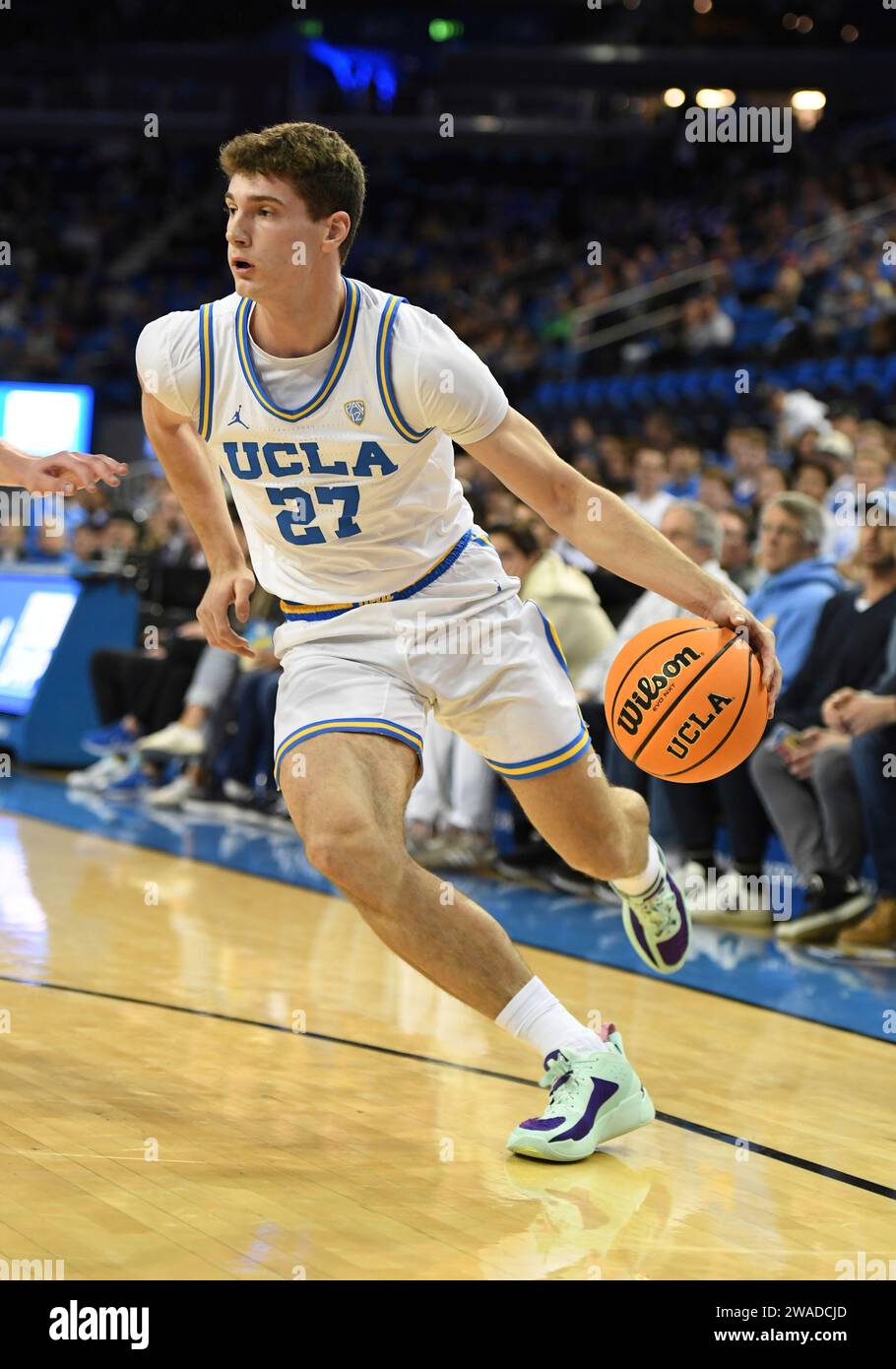 LOS ANGELES, CA - JANUARY 03: UCLA Bruins guard Jan Vide (27) drives ...