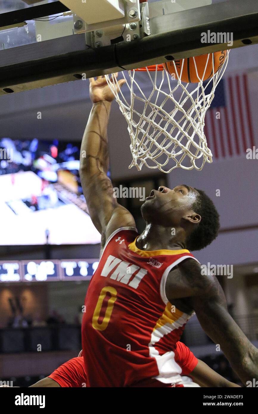 SPARTANBURG, SC - JANUARY 03: VMI Keydets guard Tyran Cook (0) with a reverse lay up during a ...