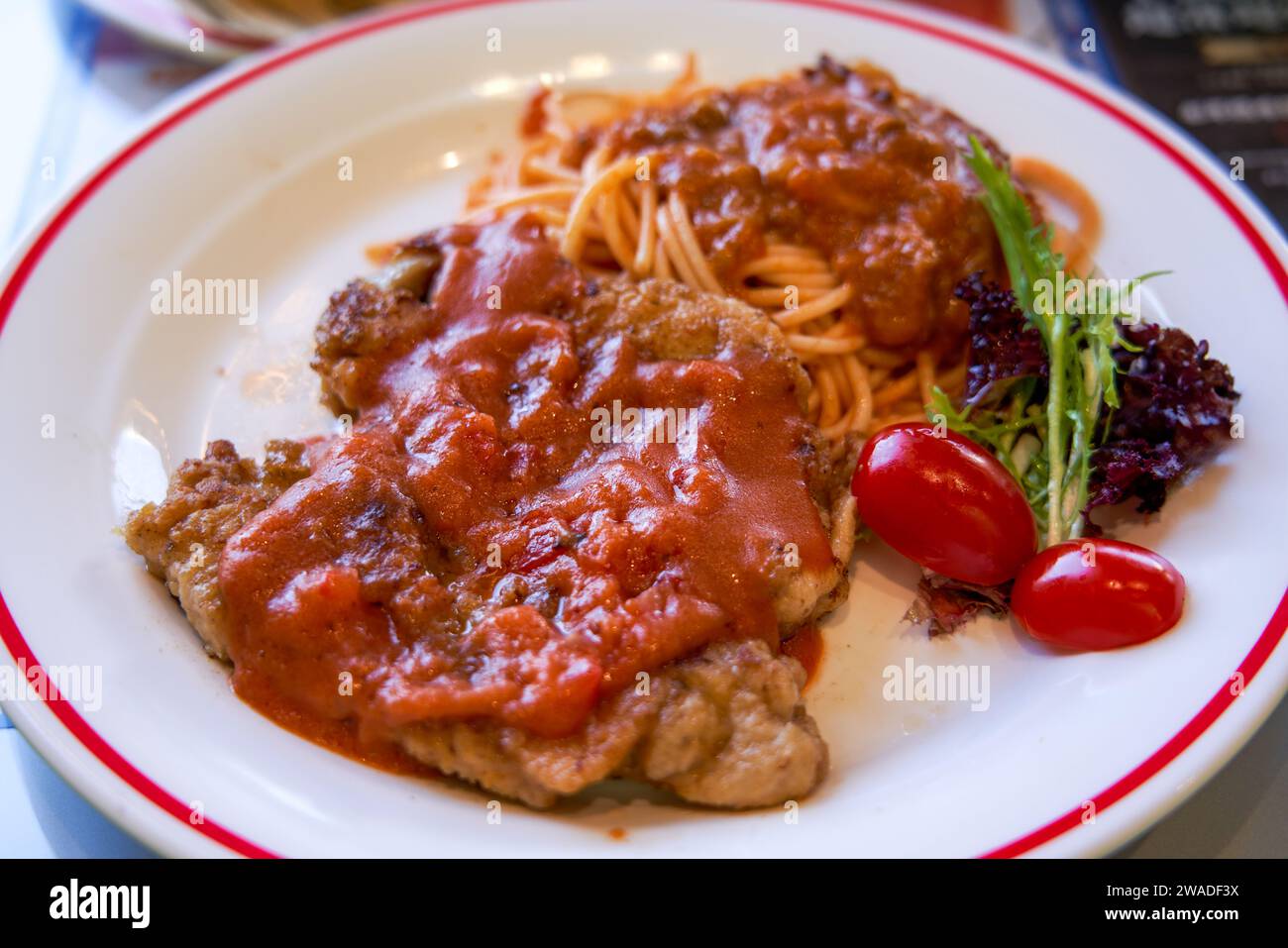 Delicious tomato pork chop with pasta in Hong Kong tea restaurant Stock ...