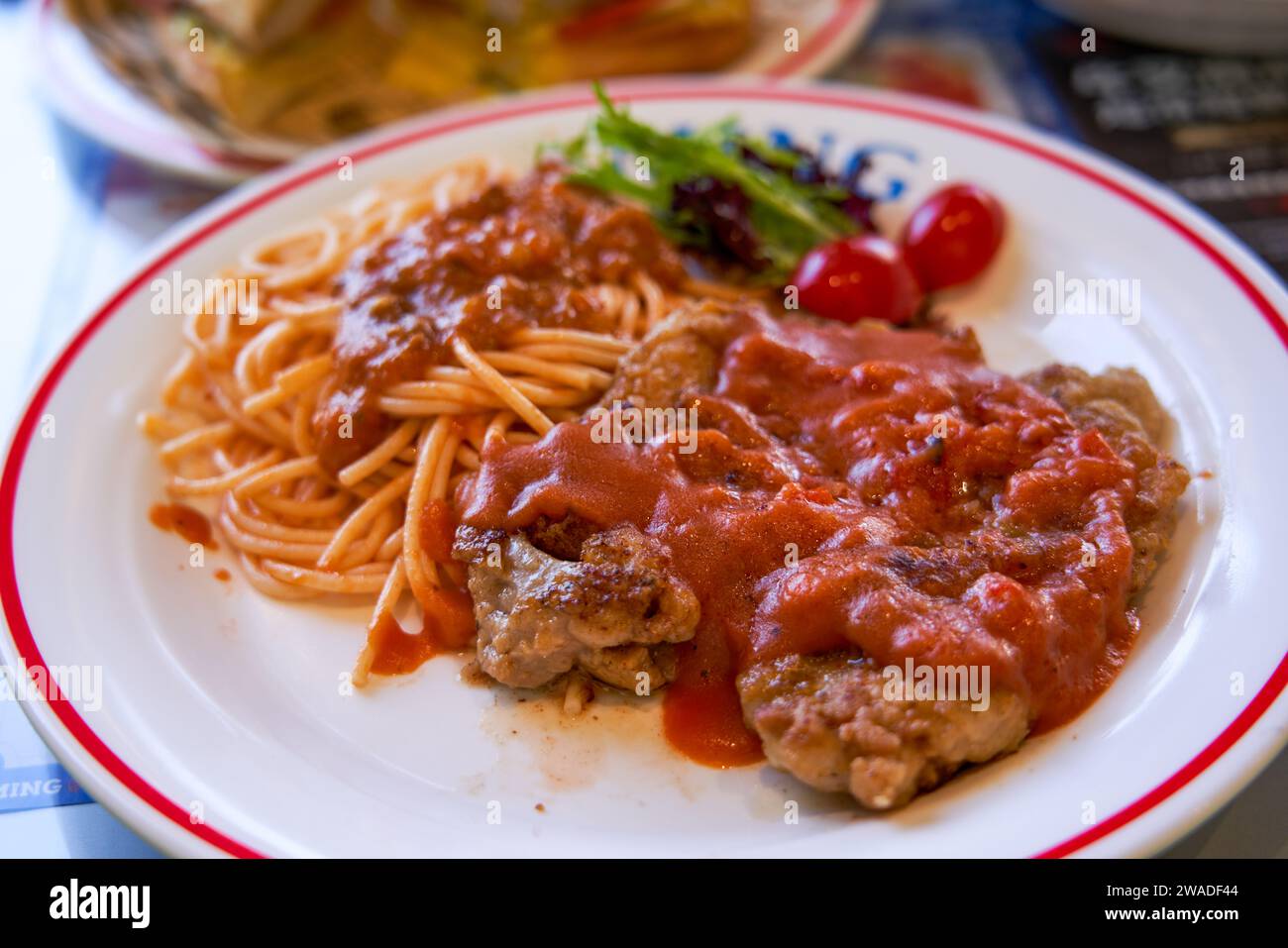 Delicious tomato pork chop with pasta in Hong Kong tea restaurant Stock ...
