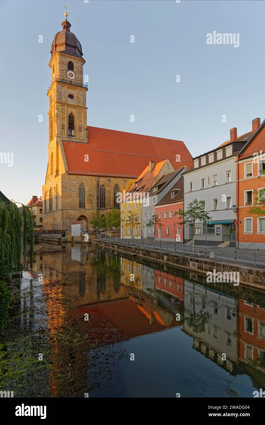Gentle morning light falls on a historic city view with the church ...