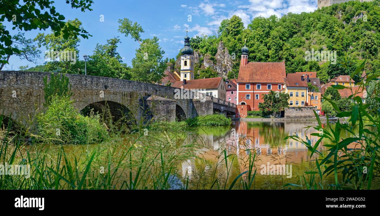 Panoramic view of the ancient stone bridge over the river Naab with the ...