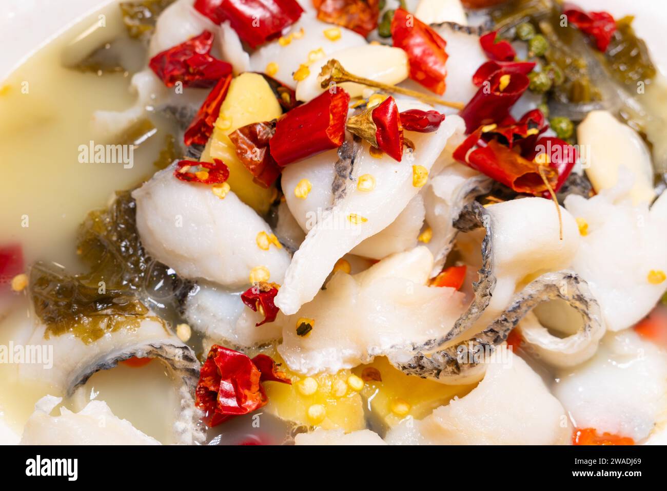 top view boiled fish with pickled cabbage and chili close up Stock ...