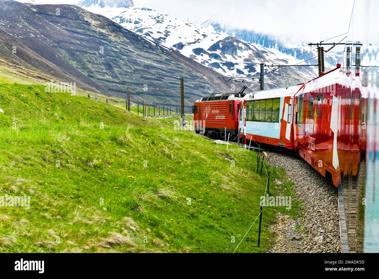 Zermatt 24,5,2023: Glacier Express red swiss train in Swiss Alps ...