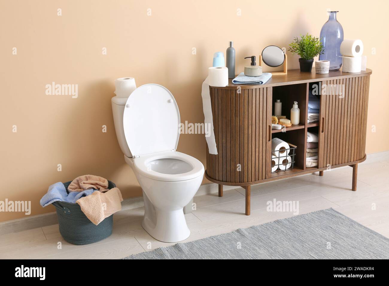 Stylish interior of modern restroom with different bath supplies Stock ...