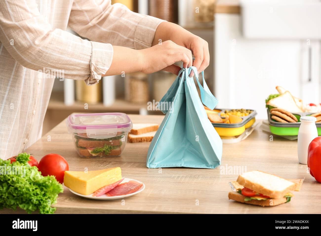 Girl packing lunch school hi-res stock photography and images - Alamy